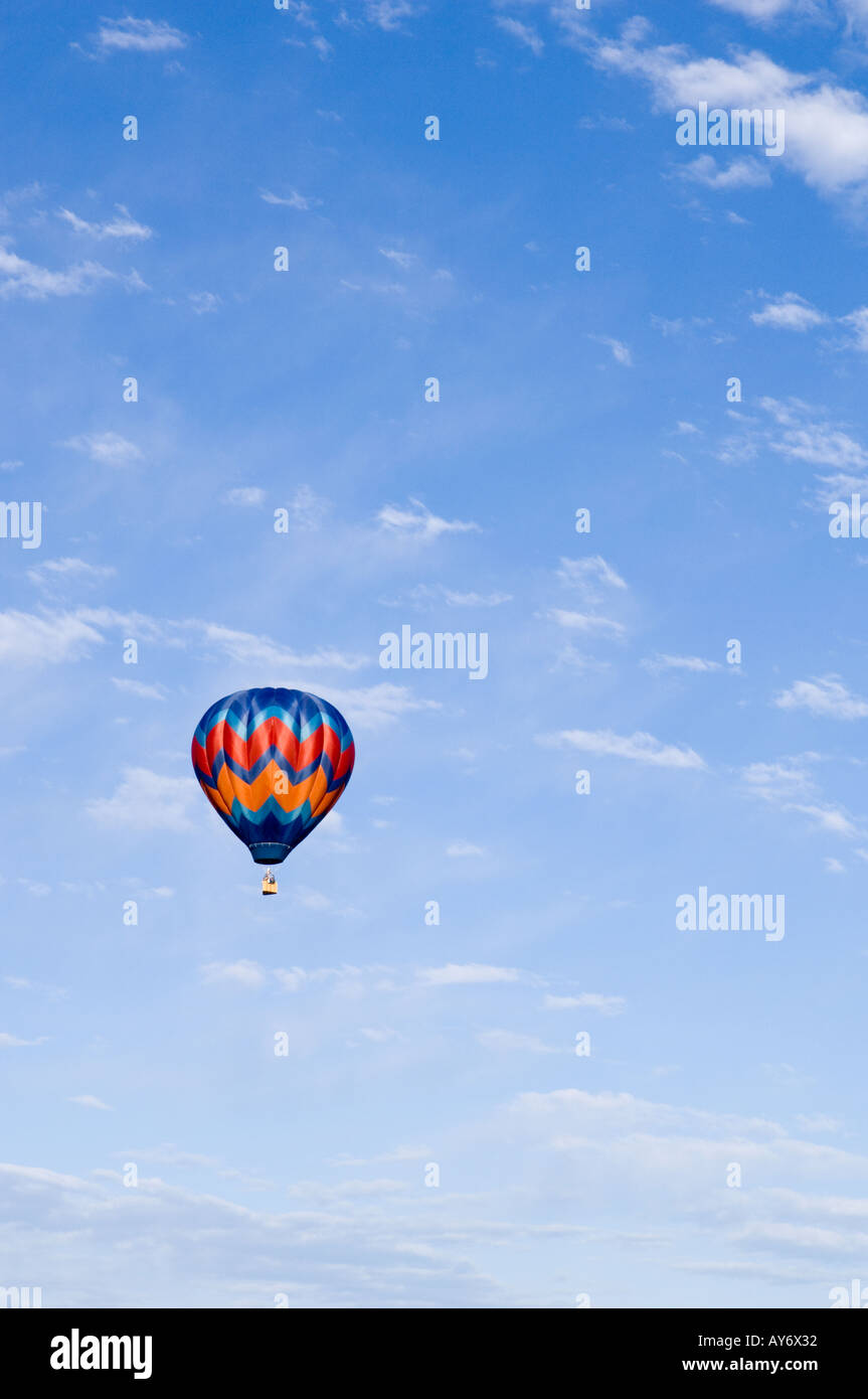 Single Hot Air Balloon Floats In Quiet Isolation Stock Photo - Alamy