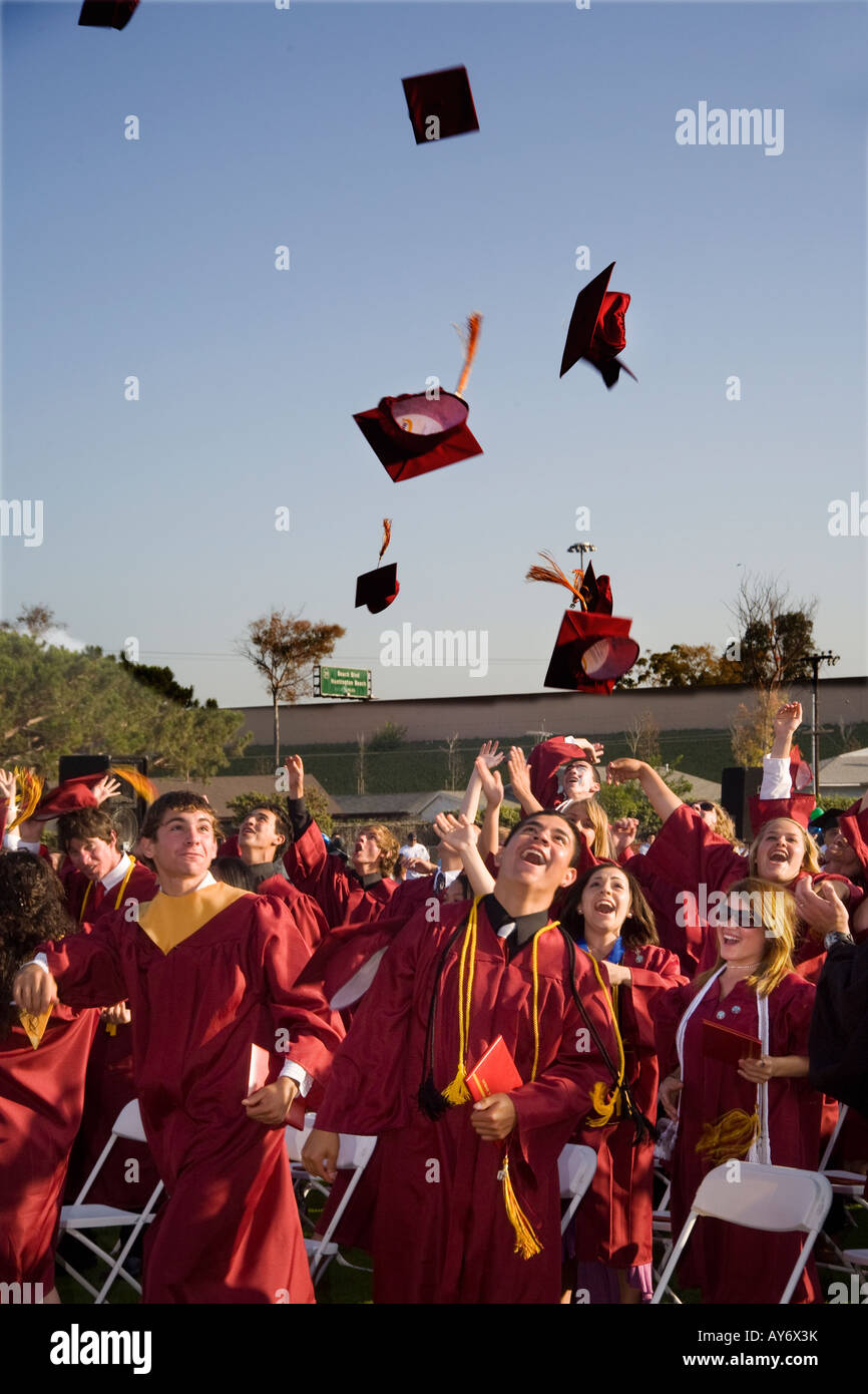 Throwing Graduation Red Caps In The Air