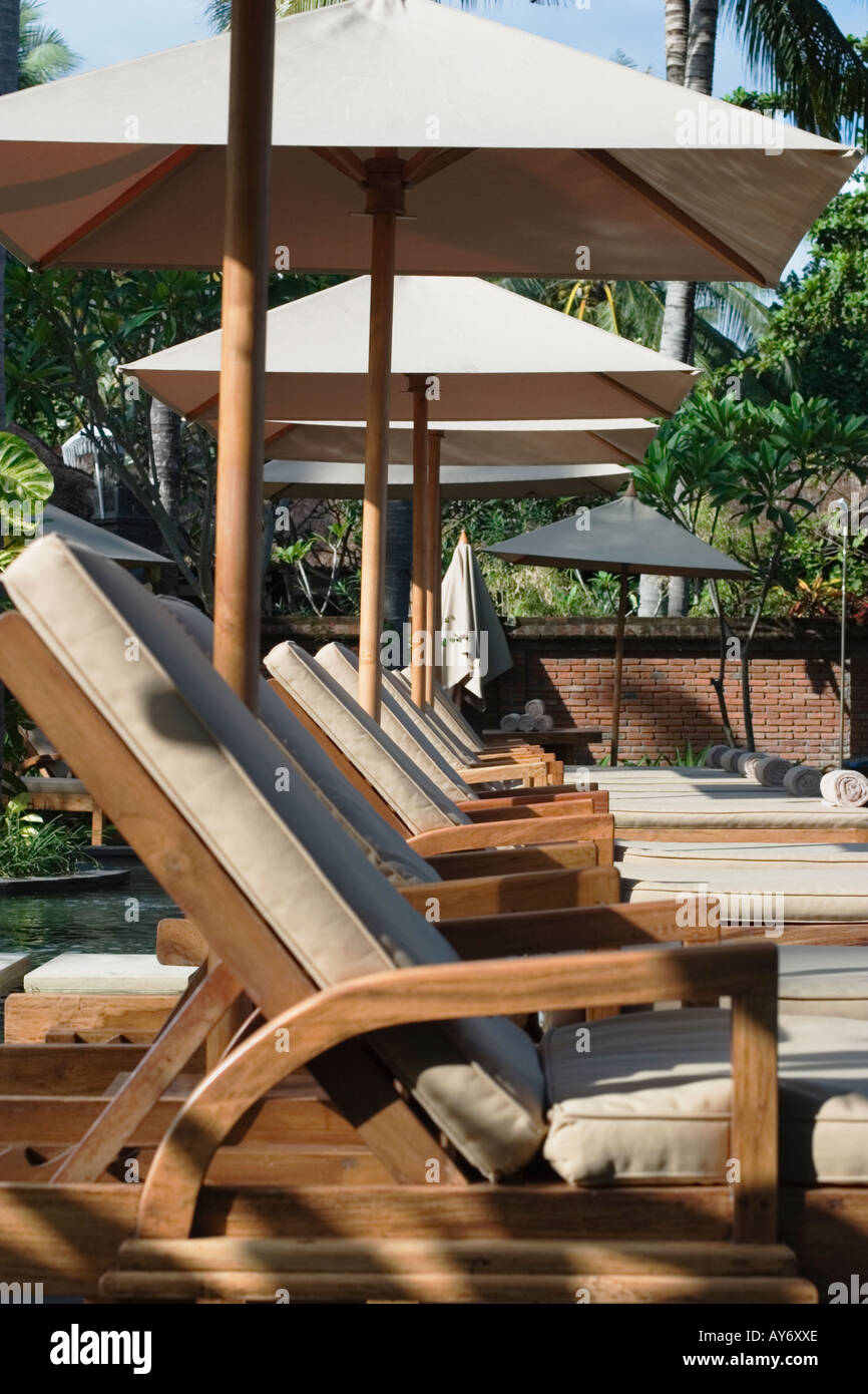 Sunbathing chairs at resort in Lombok, Indonesia Stock Photo - Alamy