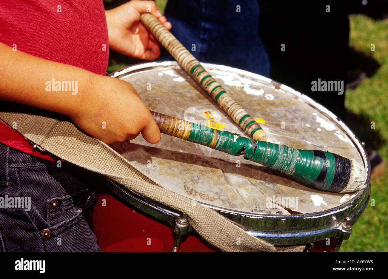 A Hispanic drummer with the ethnic dance troop Danza Matachin Pavo Real ...