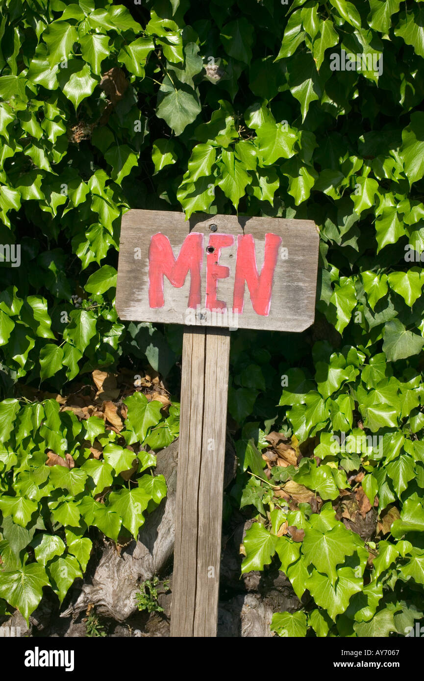 Men sign outdoors Stock Photo - Alamy