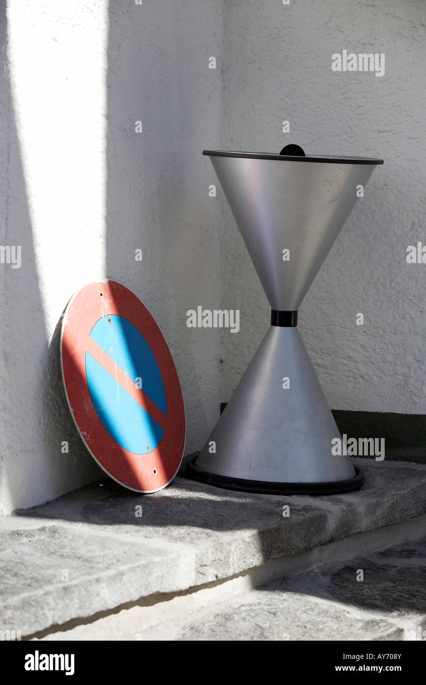 A diablo- shaped ash-tray, and street sign Stock Photo - Alamy