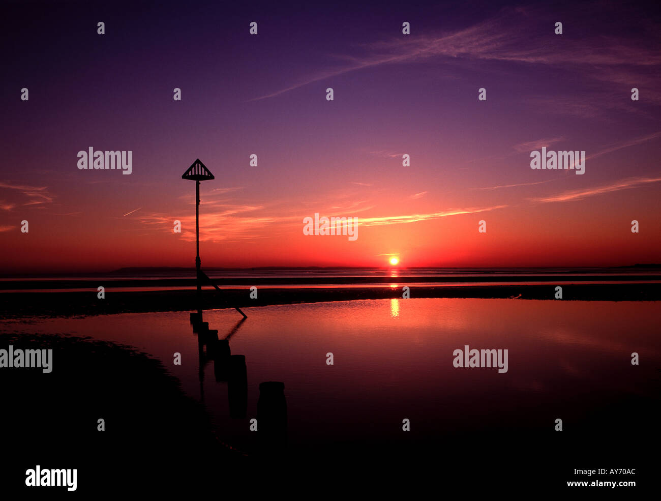 Sky colours nature water beach sunset uk red purple hi-res stock ...