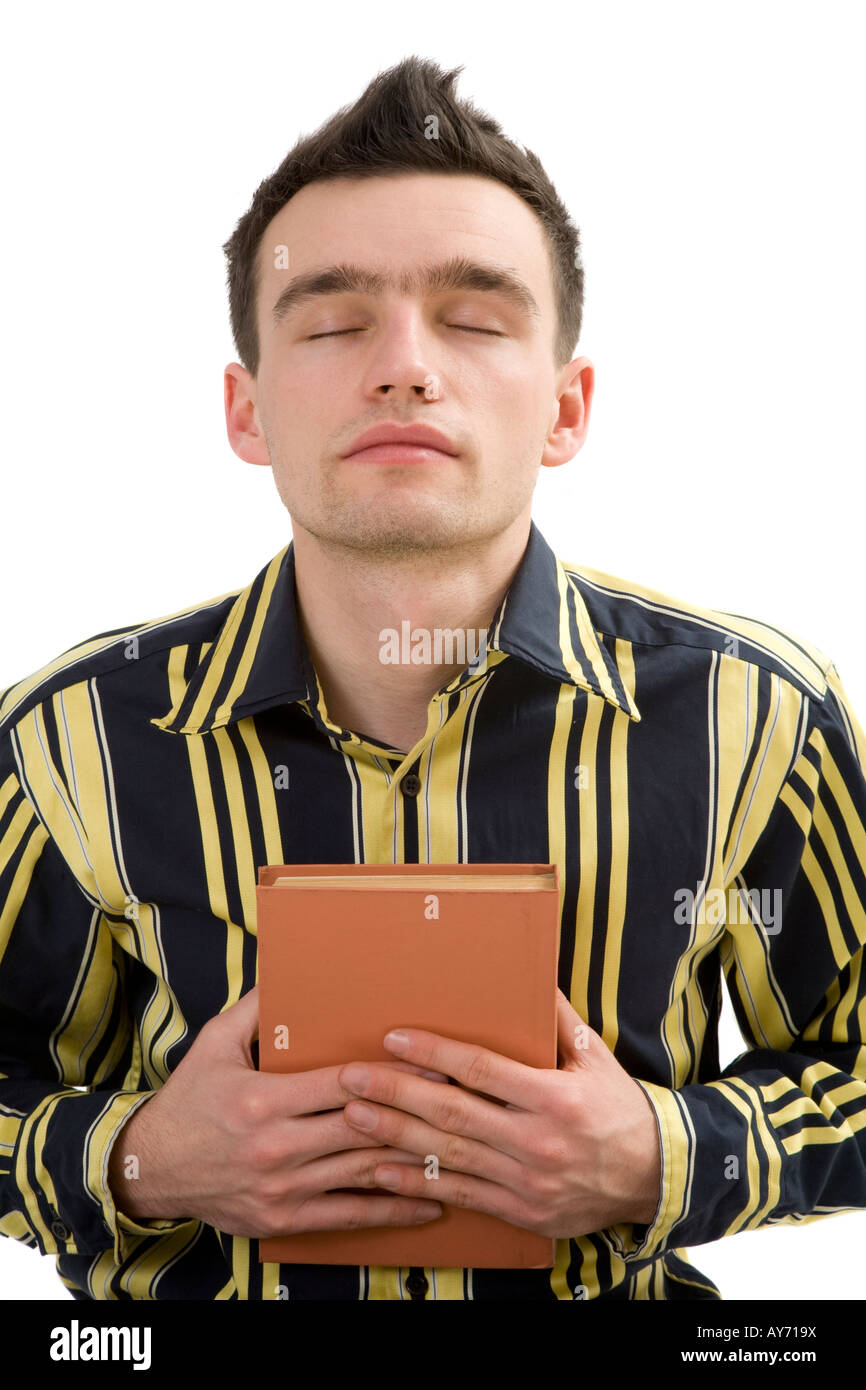 Man holding a book with passion Stock Photo - Alamy