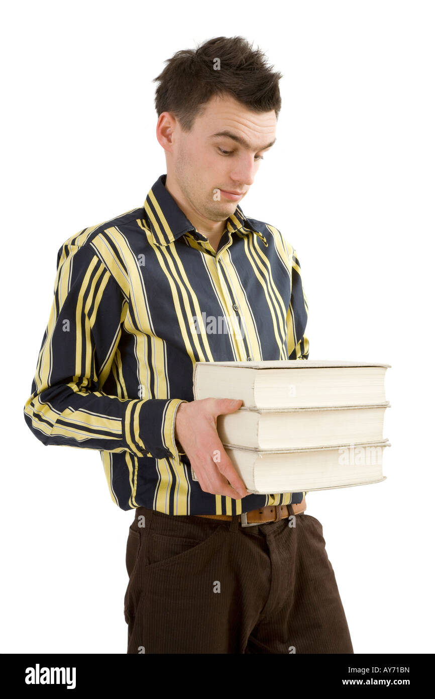 Man carring a stack of big books Stock Photo - Alamy