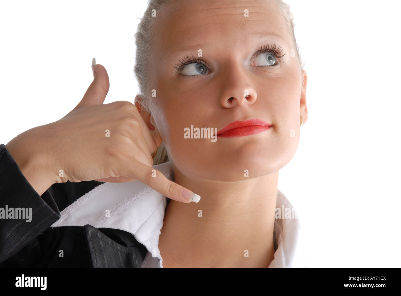 Young woman gesturing with three middle fingers folded against palm ...