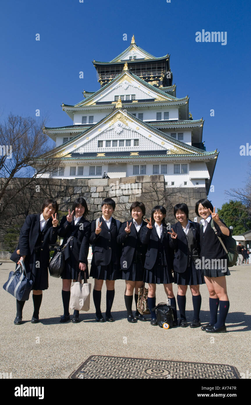 "Japanese students pose in front of Osaka Castle Japan Stock Photo - Alamy