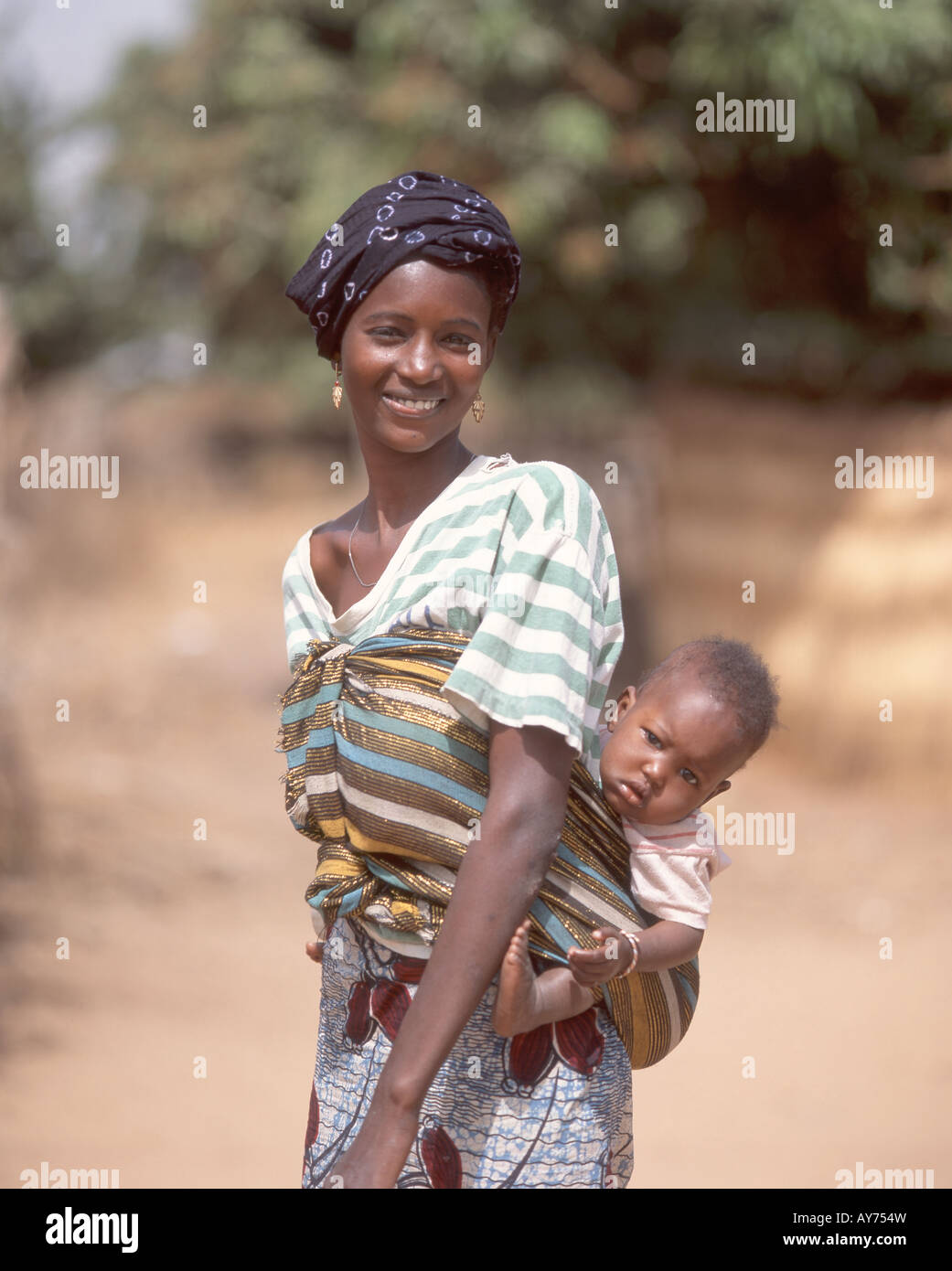 Village mother and child, African village compound, Juffure, North Bank ...
