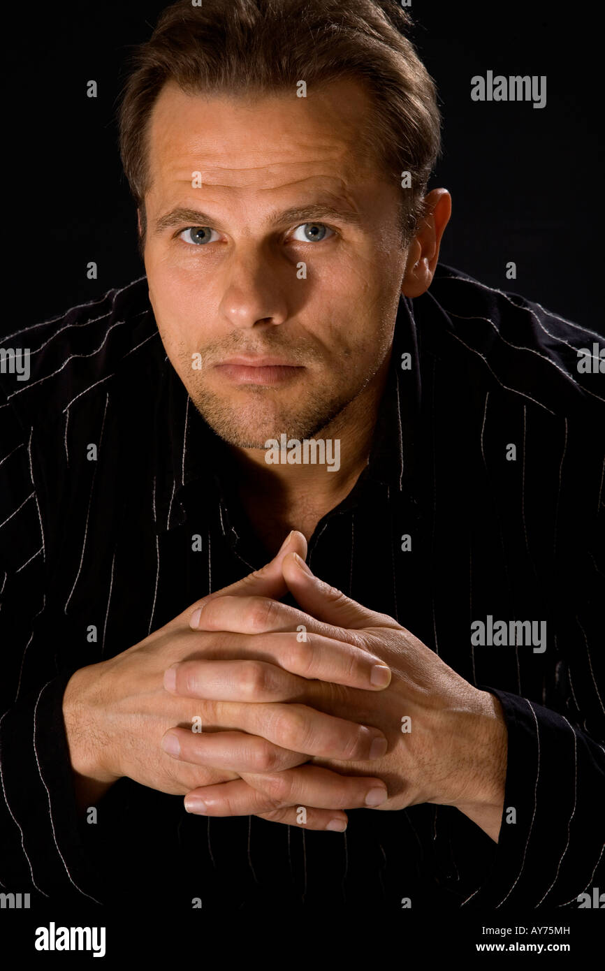 Portrait of a Man on black background Stock Photo - Alamy
