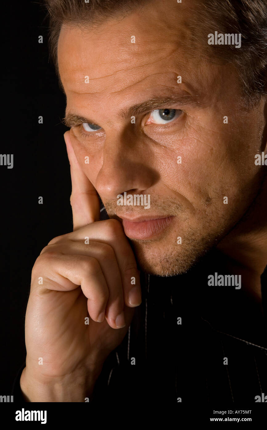 Portrait of a Man on black background Stock Photo - Alamy