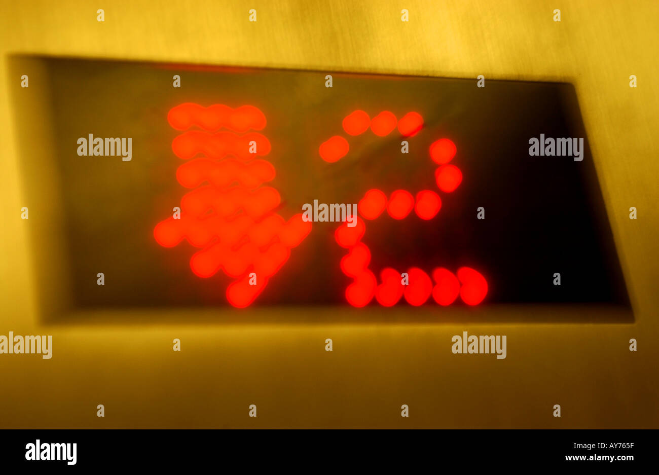 Abstract color concept image of numbers and a down arrow on an elevator ...