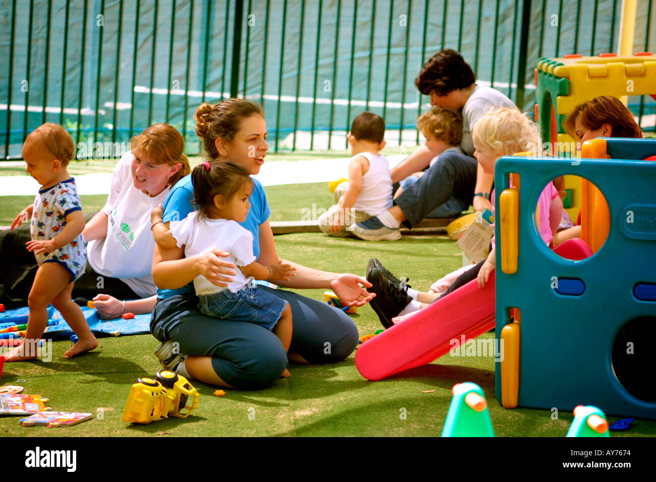 Child minding at a day care centre Stock Photo - Alamy