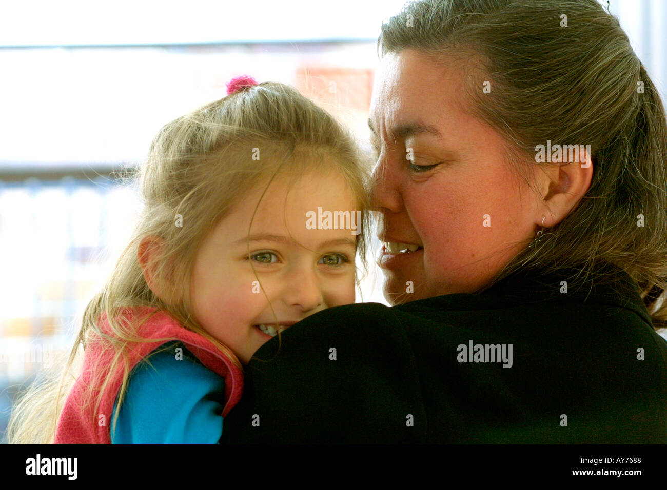 Child minding at a day care centre Stock Photo - Alamy