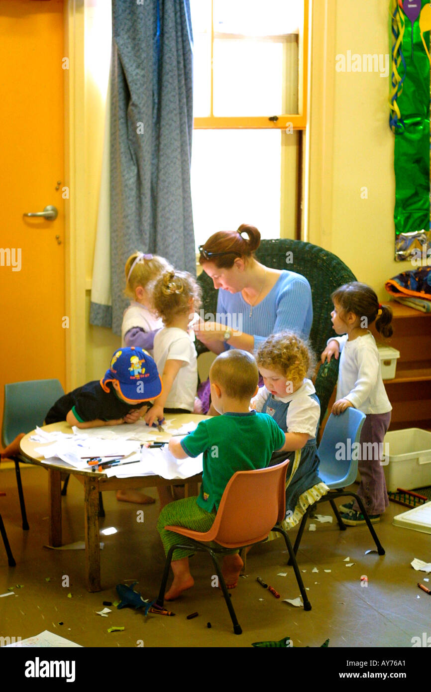 Child minding at a day care centre Stock Photo - Alamy