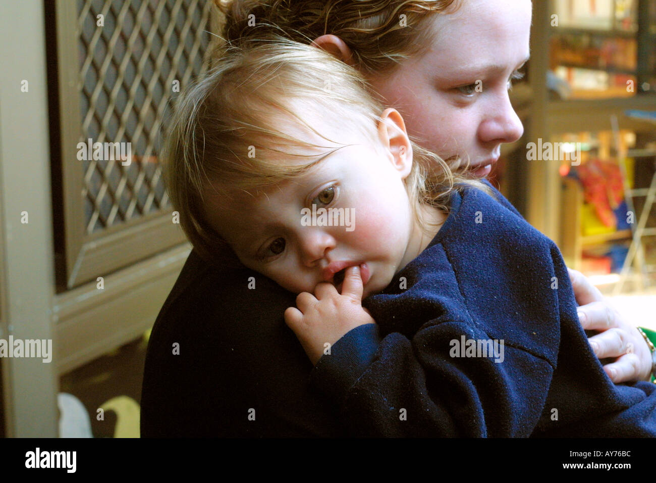 Child minding at a day care centre Stock Photo - Alamy