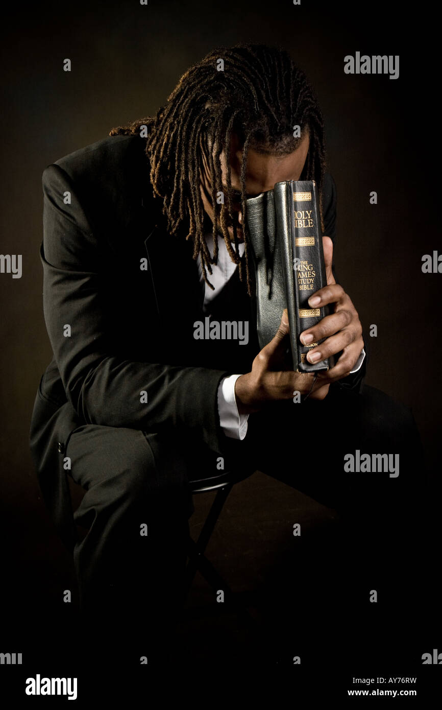 african american, man, in suit, with bible Stock Photo - Alamy