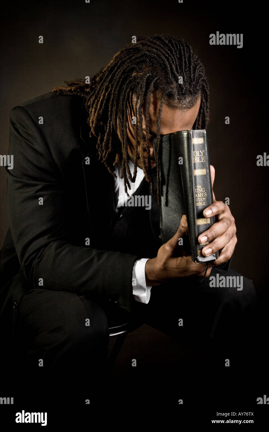 african american, man, in suit, with bible Stock Photo - Alamy
