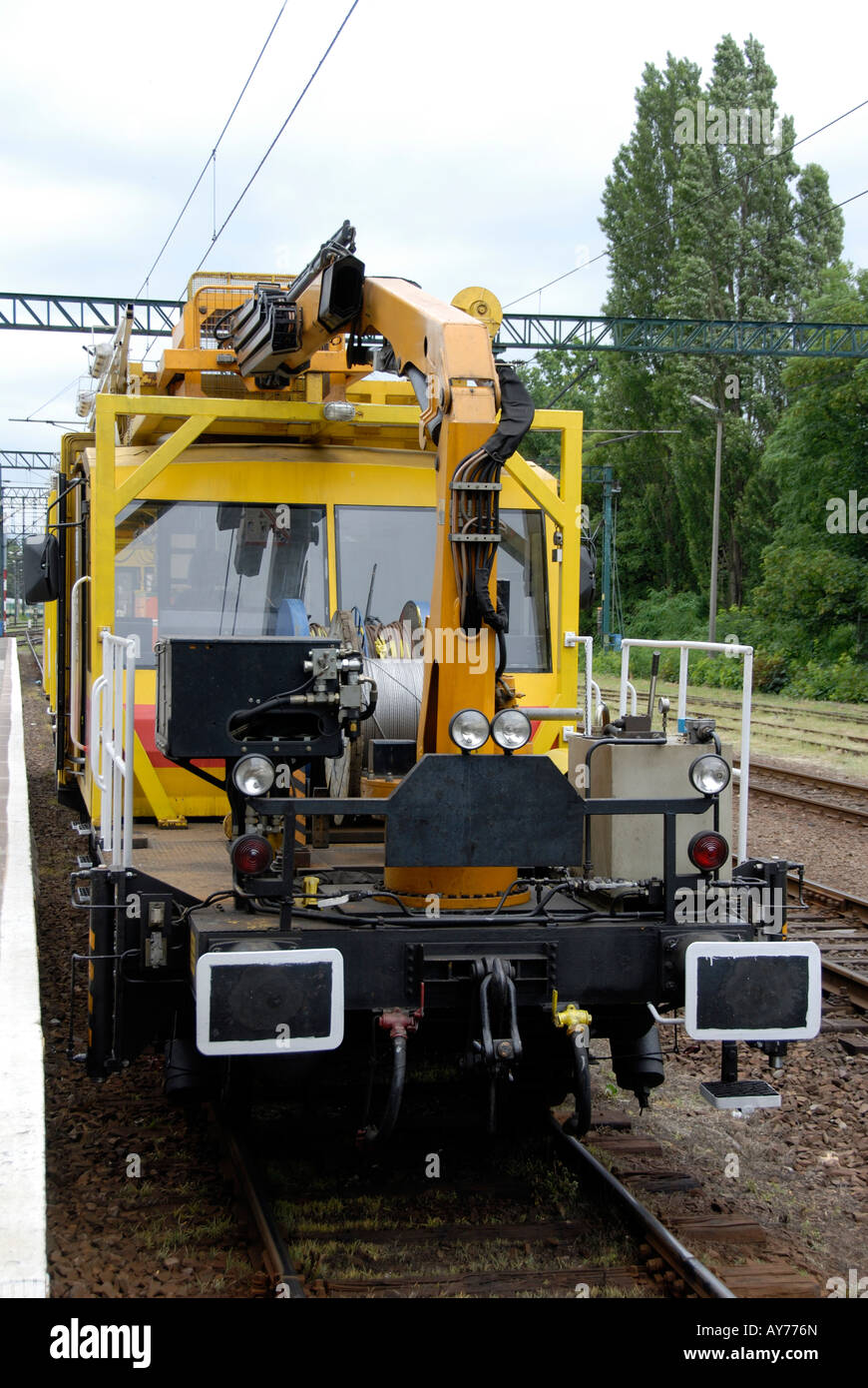 Yellow trolley on railway Stock Photo - Alamy