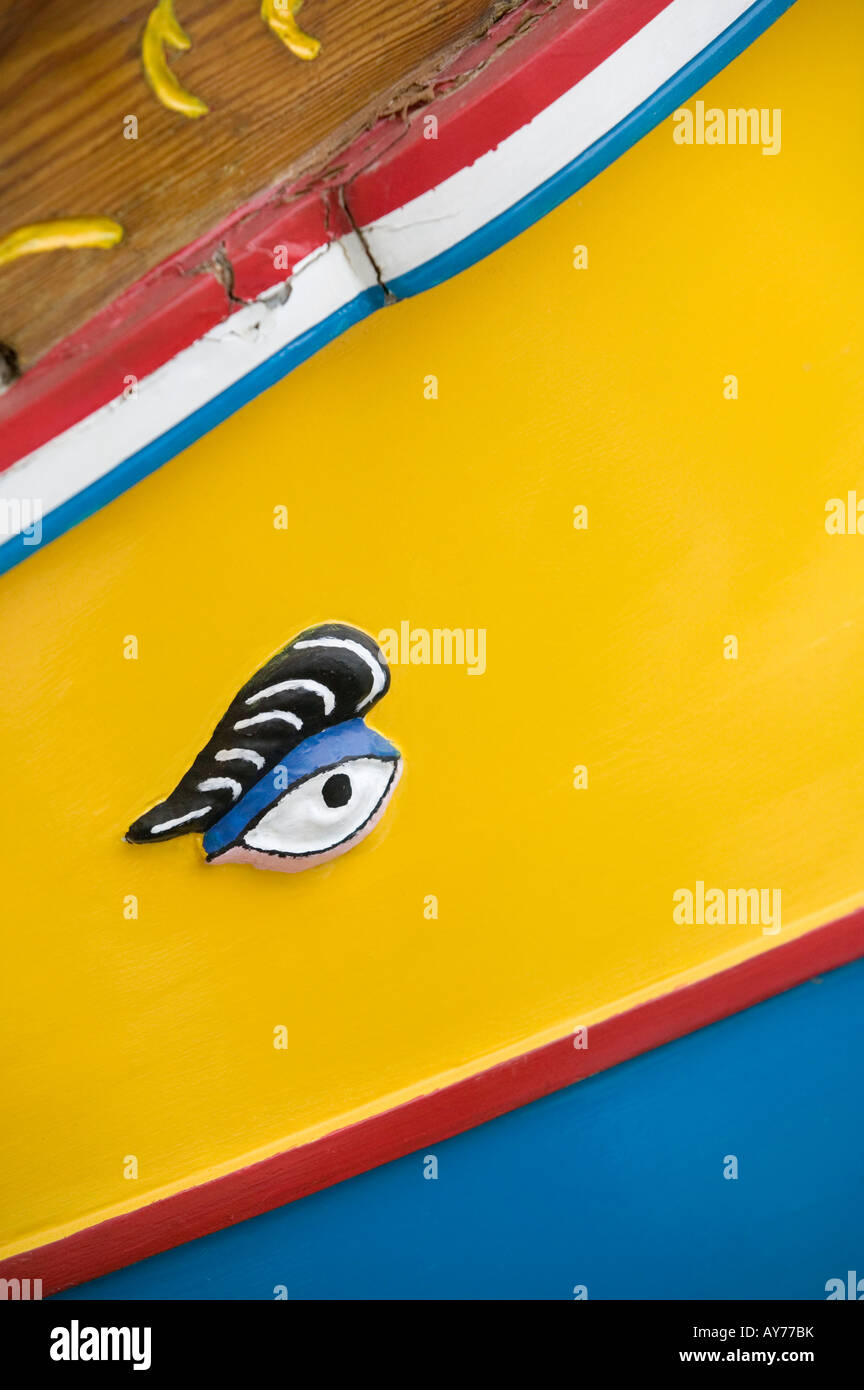 Close up of eye on Luzzu, a wooden maltese fishing boat Stock Photo - Alamy