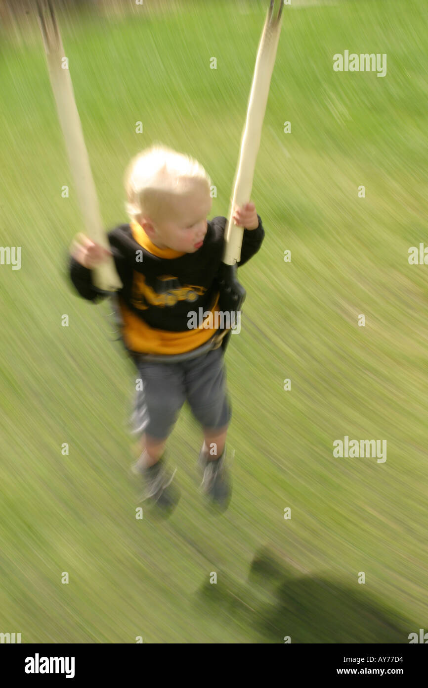 Children swing blur motion hi-res stock photography and images - Alamy