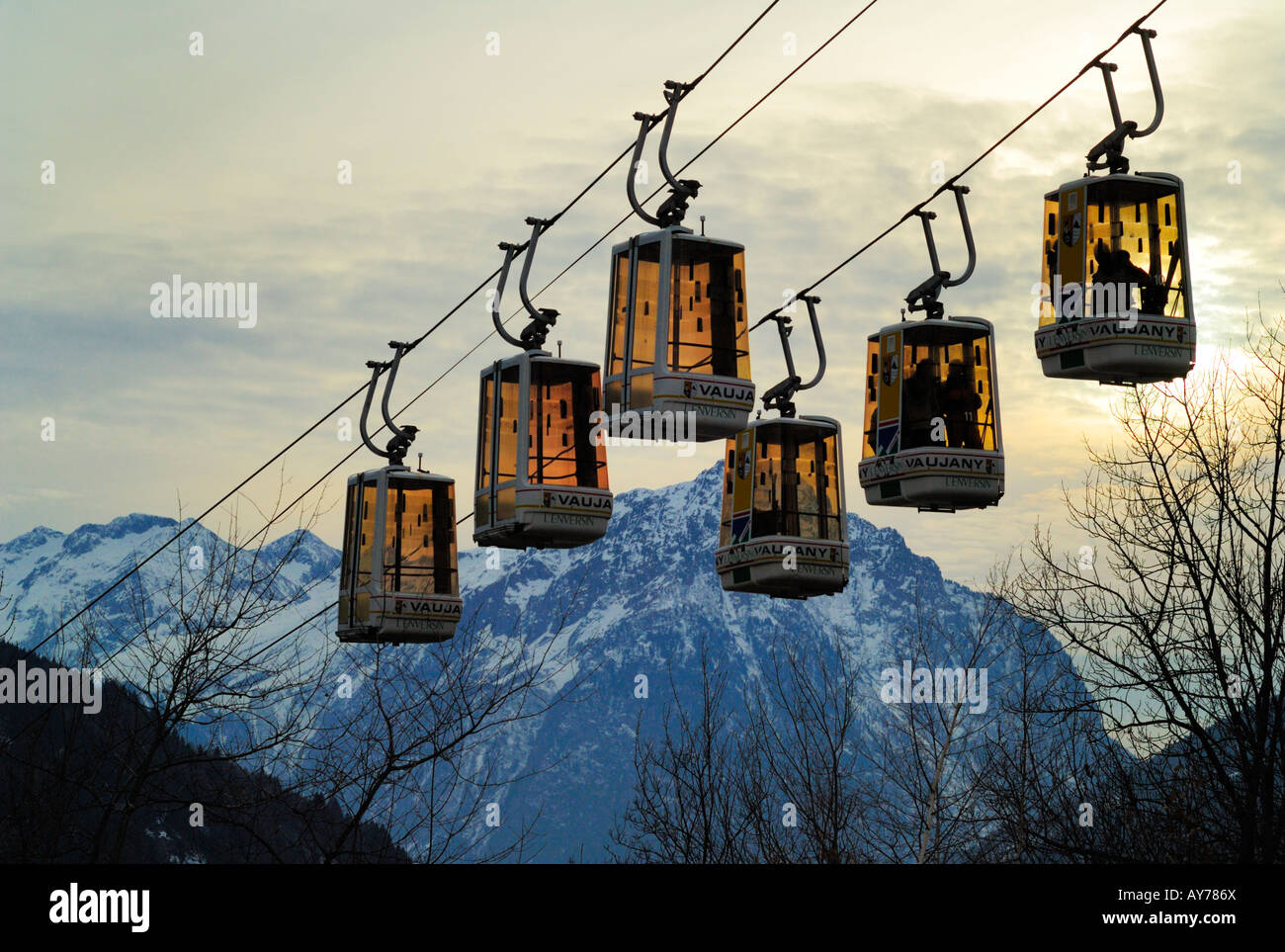 cable cars stylized view over snow mountain Stock Photo - Alamy