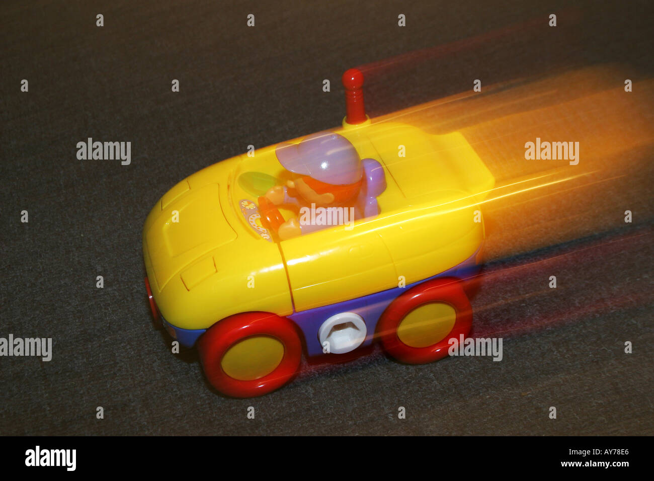 Speeding Toy Car Stock Photo - Alamy