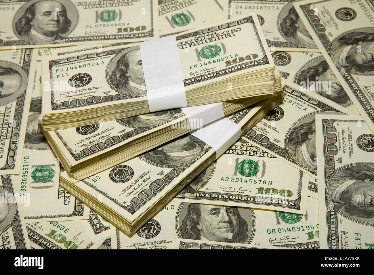 the thousands US dollars heap on dollars background Stock Photo - Alamy