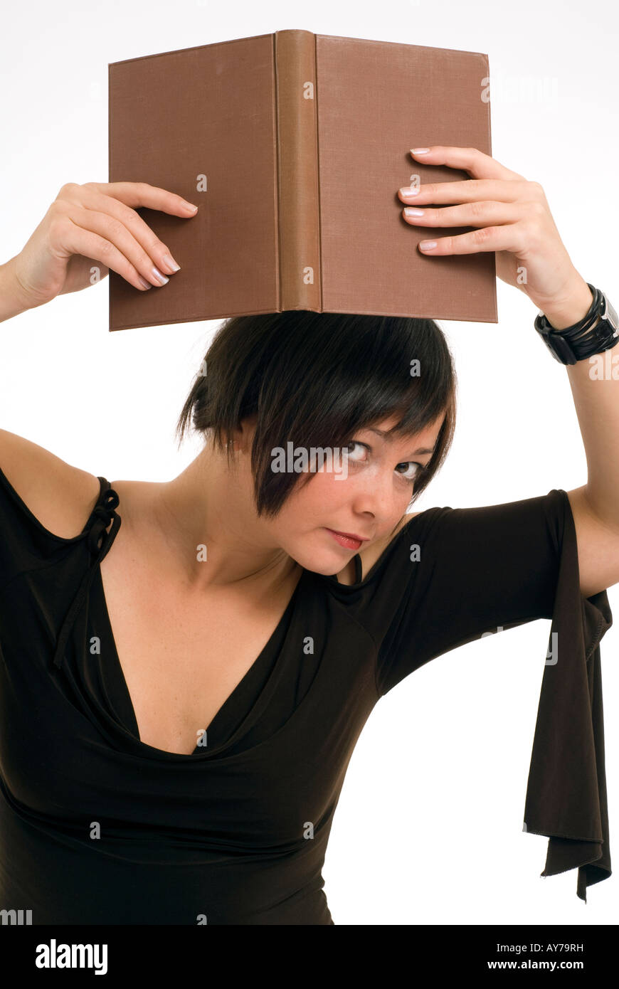Woman with a book Stock Photo - Alamy