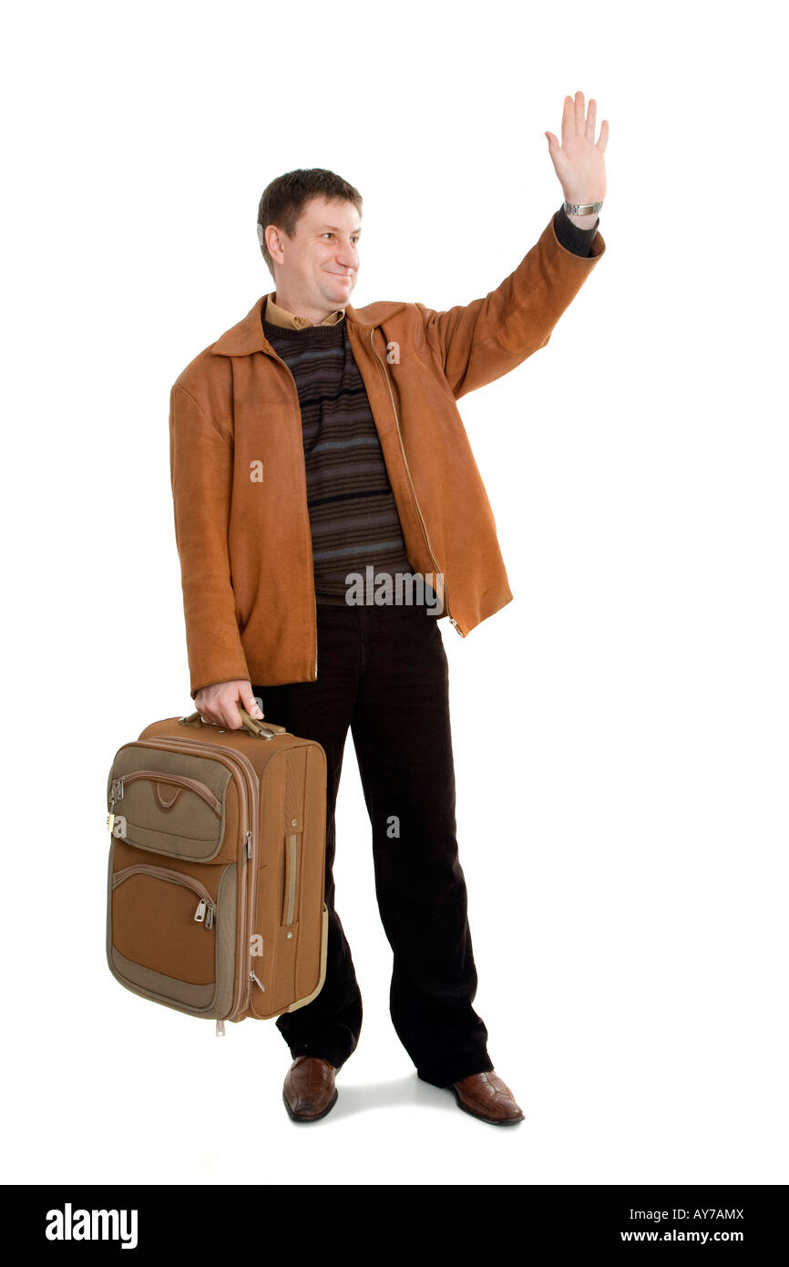 Man in brown jacket with suitcase Stock Photo - Alamy