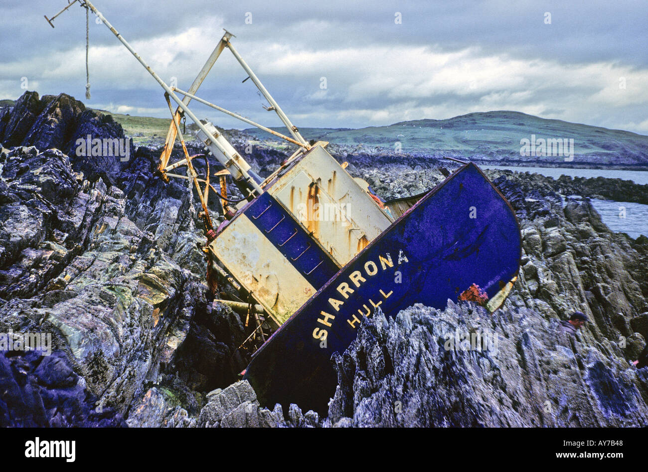 Shipwrecked on the rocks Stock Photo - Alamy