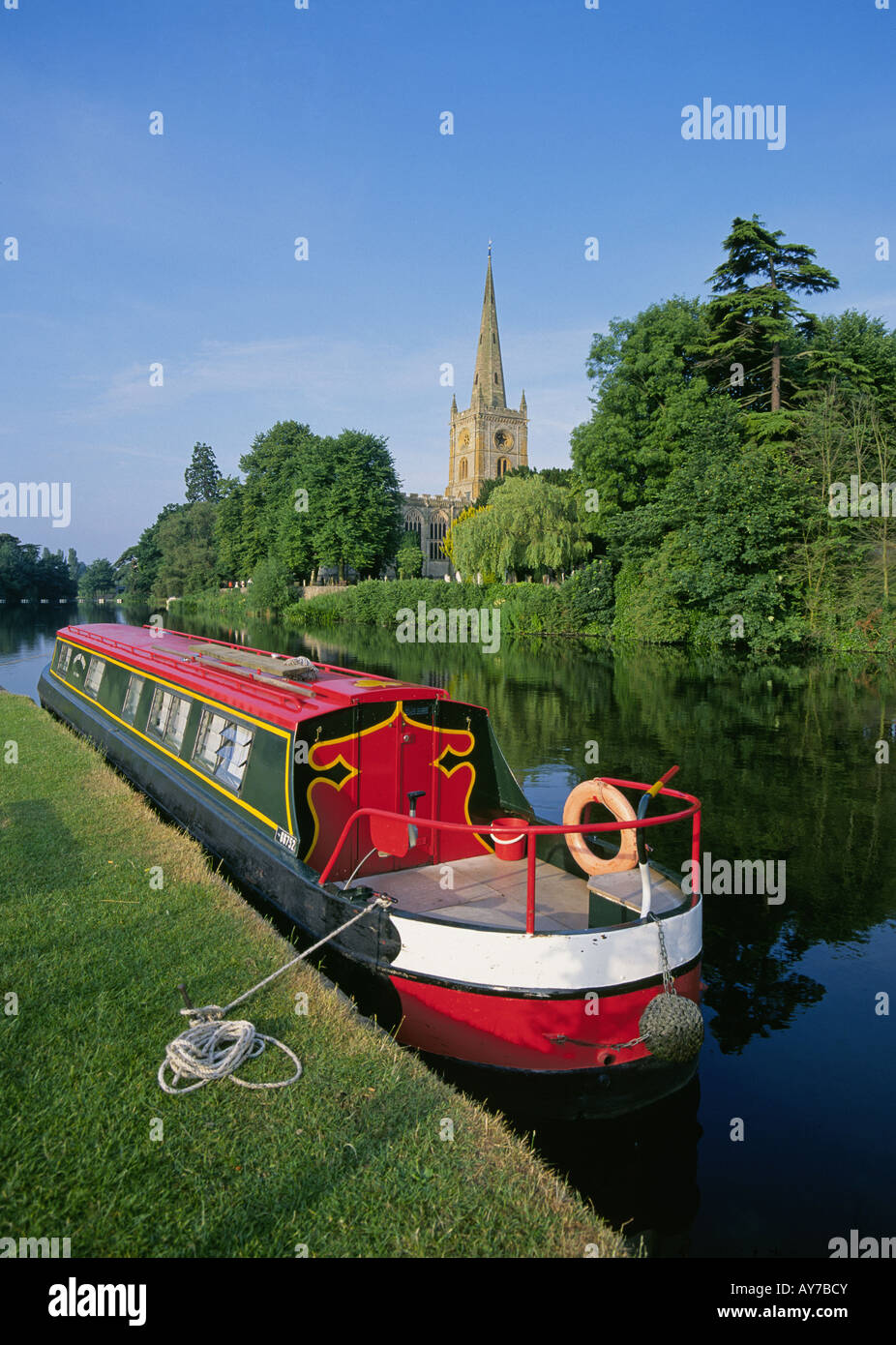 A traditional English narrowboat or canal boat on the Avon River in ...