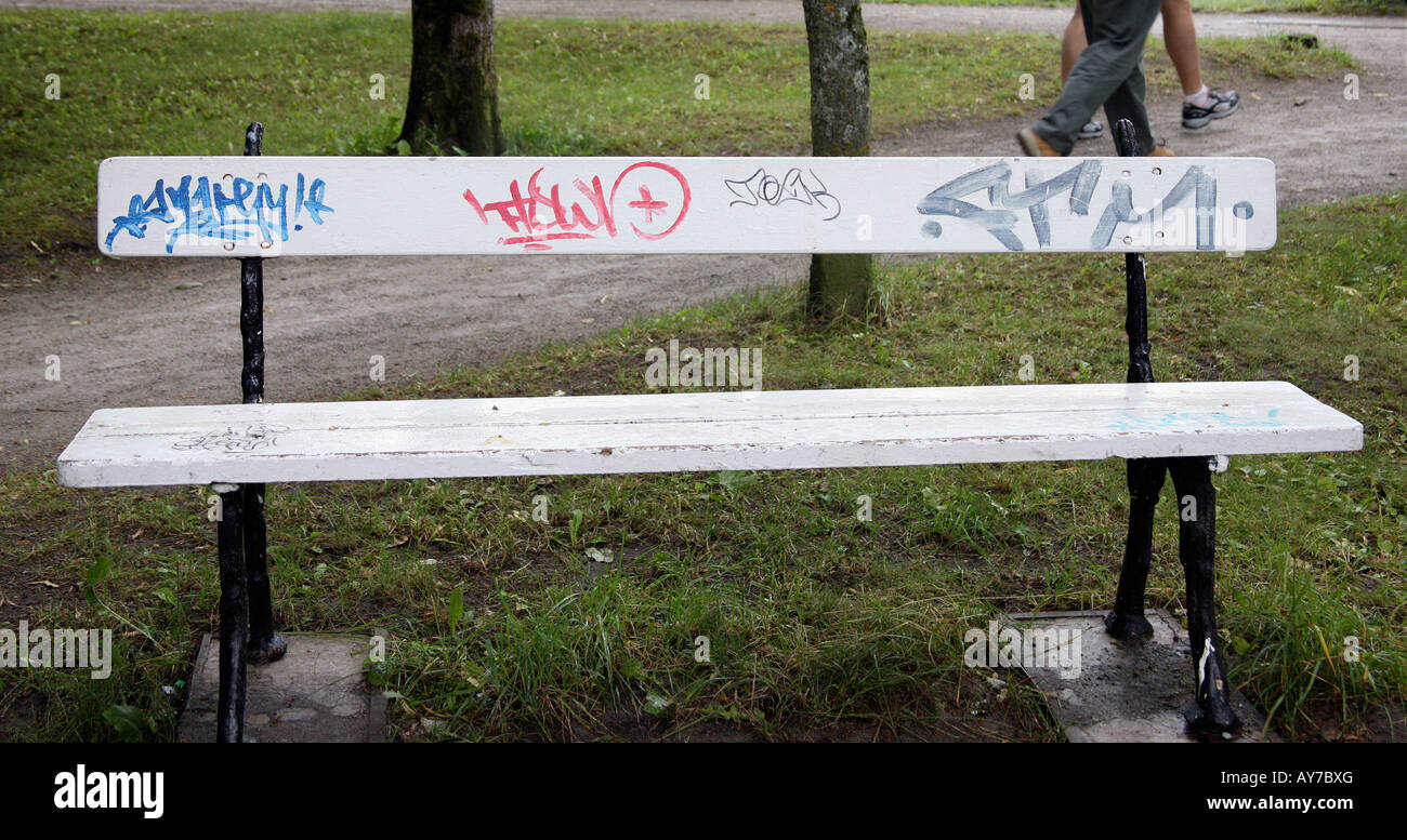 bench with graffiti in a small Estonia park Stock Photo - Alamy