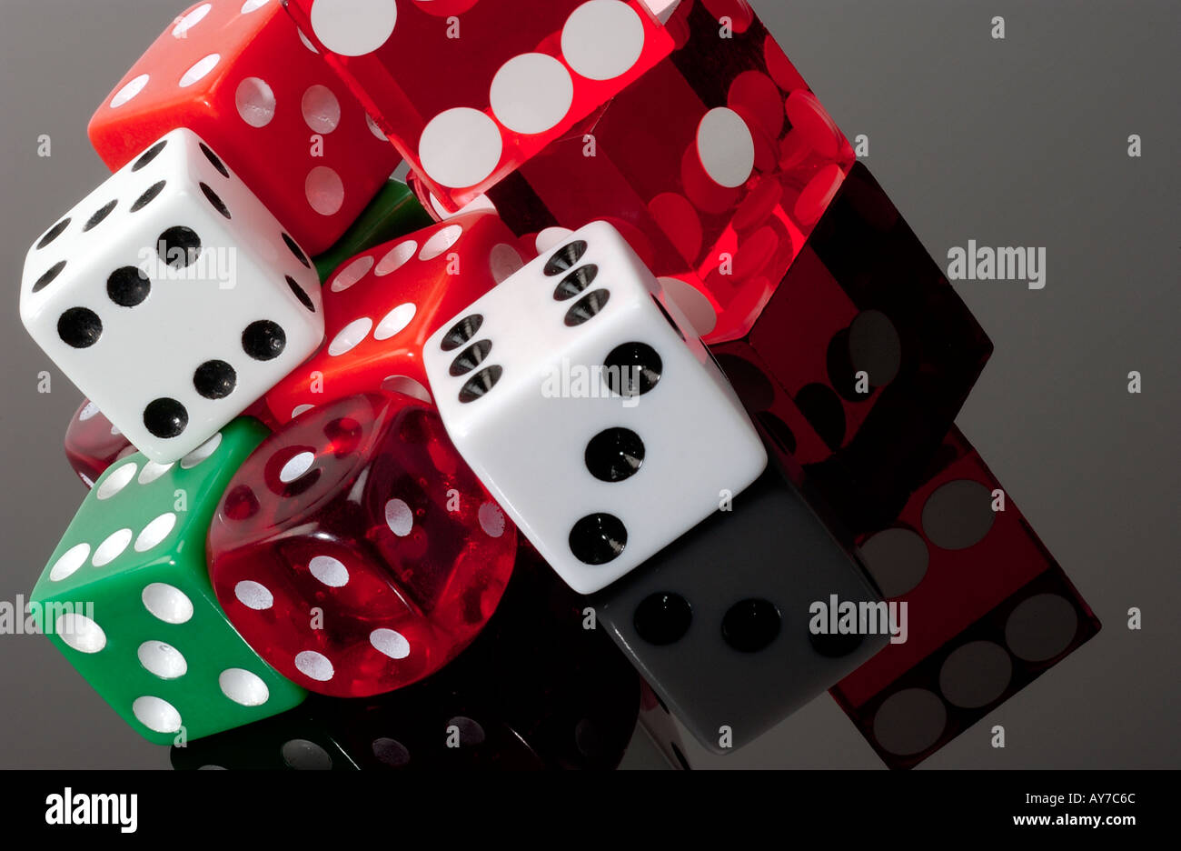 various coloured dice Stock Photo - Alamy