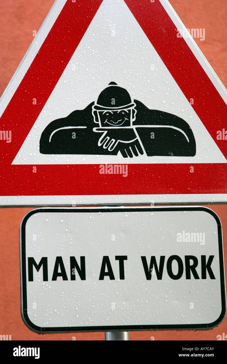 "man at work warning sign Stock Photo - Alamy
