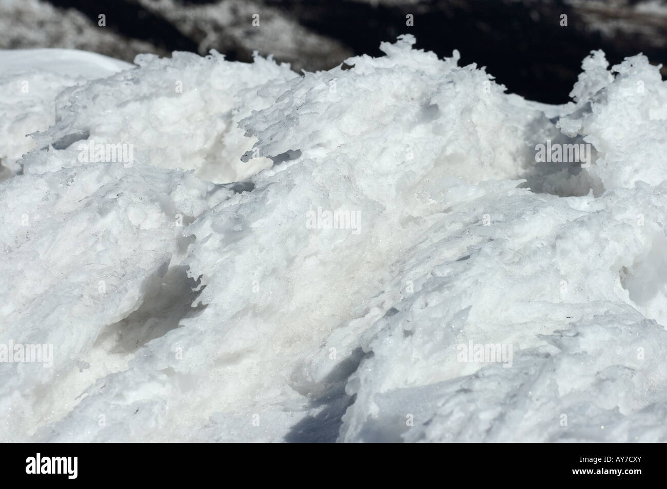 Wind form ice lumps on winter mountain precipice brink Stock Photo - Alamy