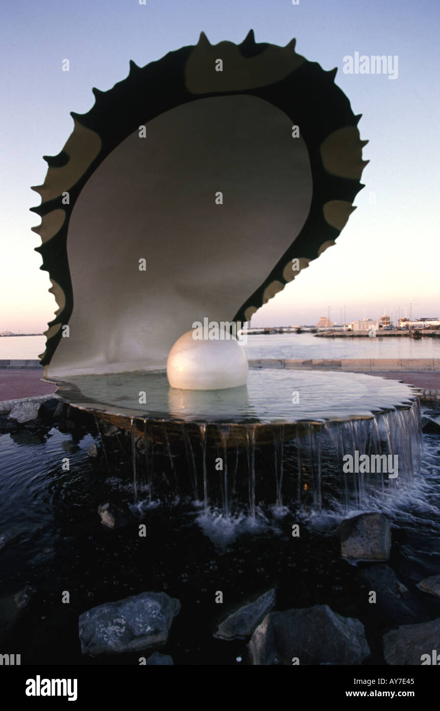 Very large oyster with pearl fountain along the shore of Doha Qatar ...