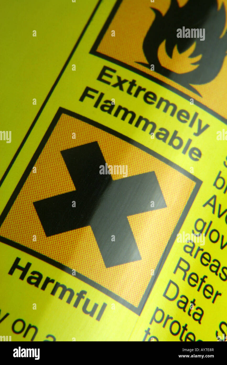 'Harmful' and 'extremely flammable' label on product packaging Stock ...