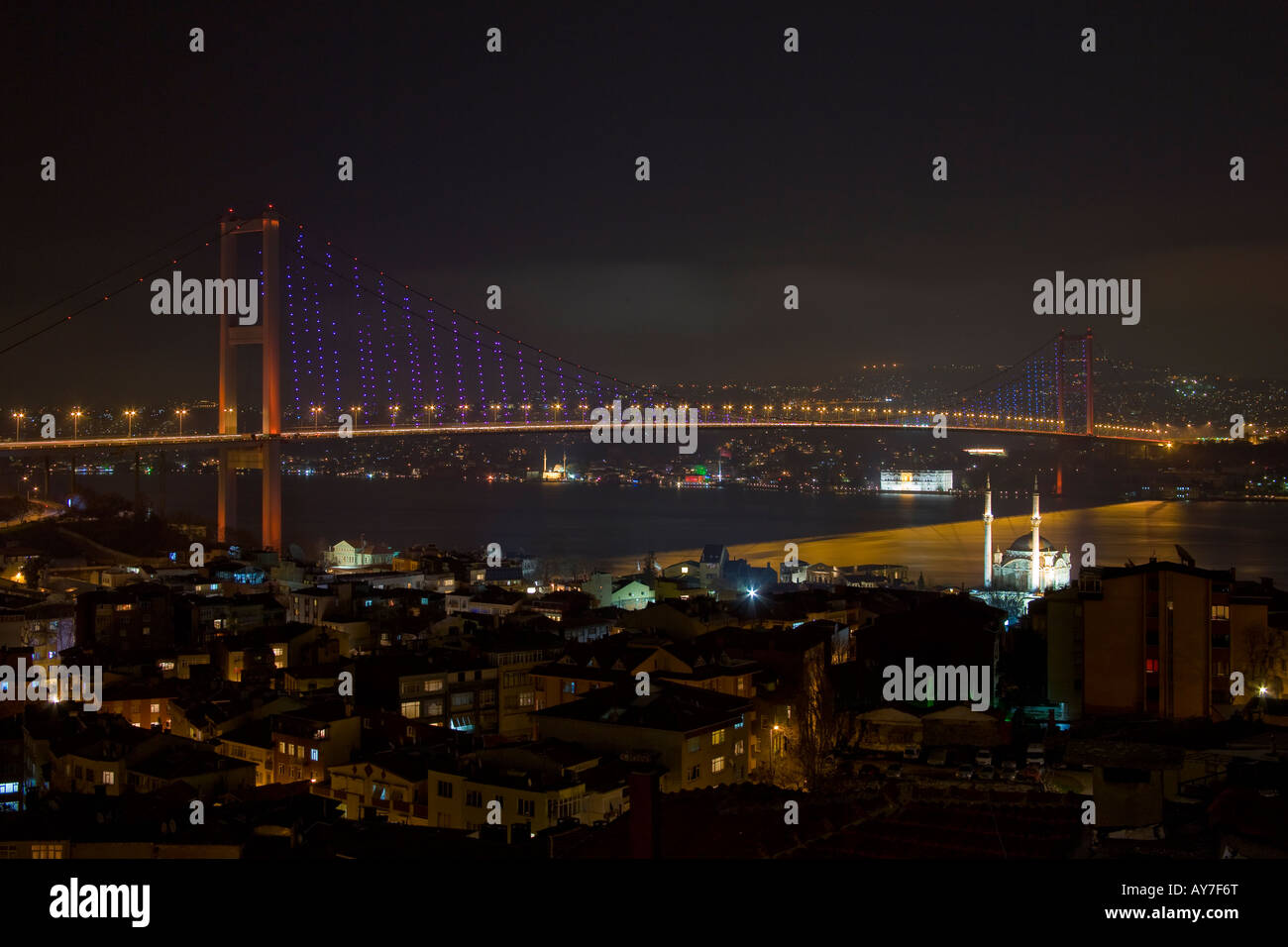 The Bosphorus Bridge and The Great Buyuk Mecidiye Mosque at night ...