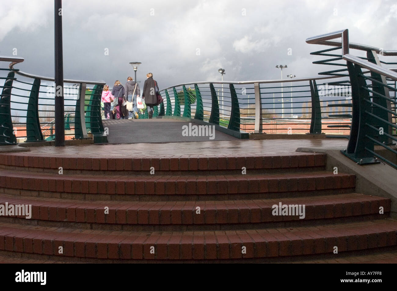 Modern design bridge from shopping centre to car park Stock Photo - Alamy
