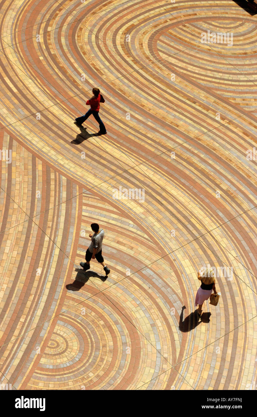 Pedestrian in a square Stock Photo - Alamy