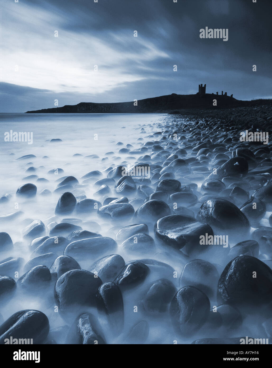 Dunstanburgh Castle from Embleton Beach Nothumberland England Stock ...