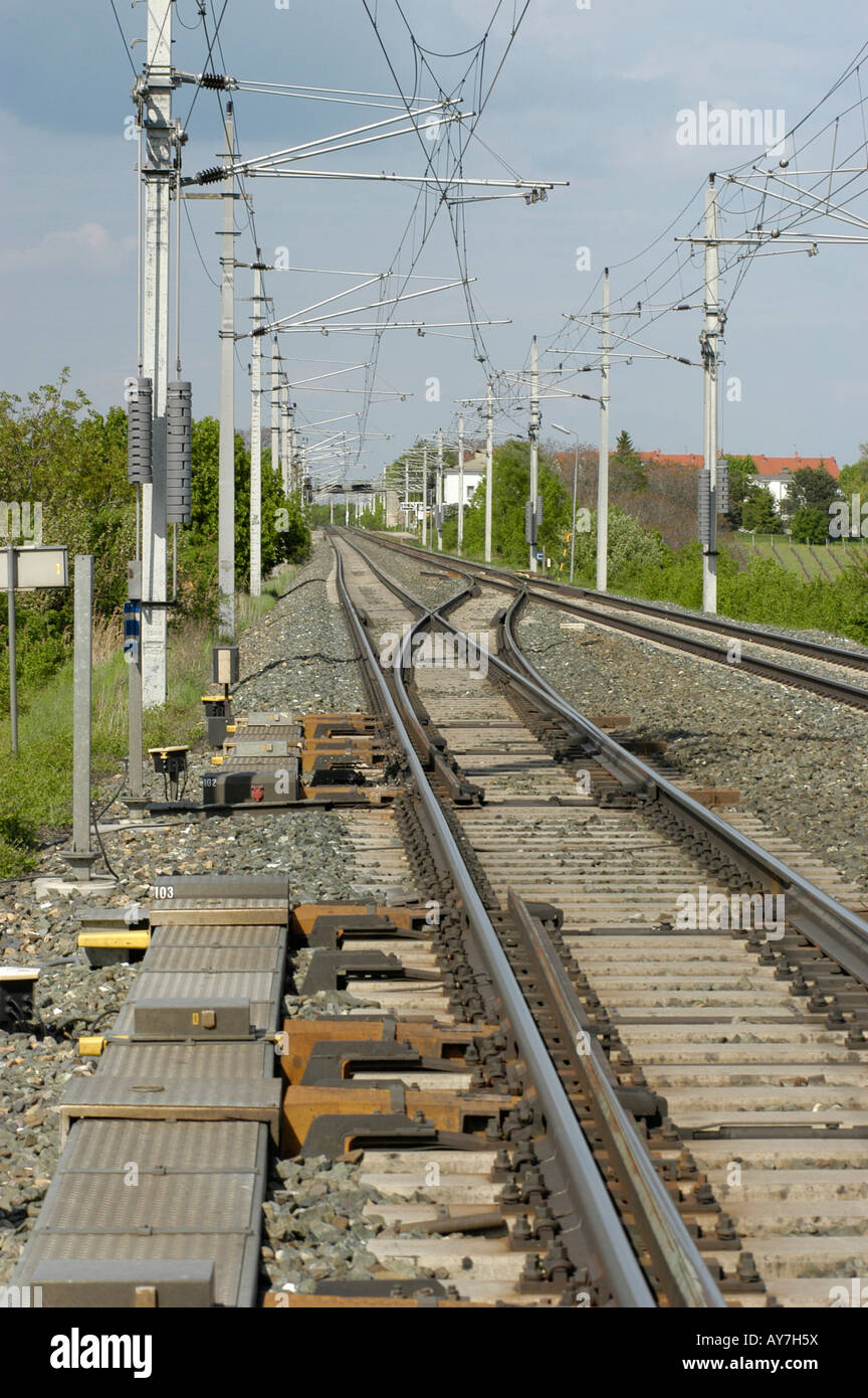 Rails on embankment with switch Stock Photo - Alamy