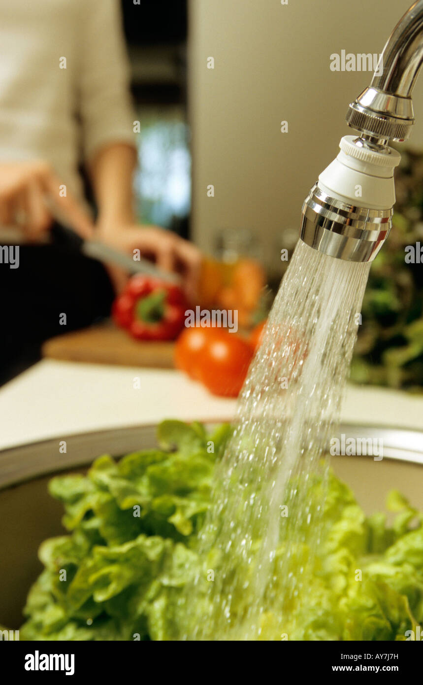 Faucet open in the kitchen Stock Photo - Alamy