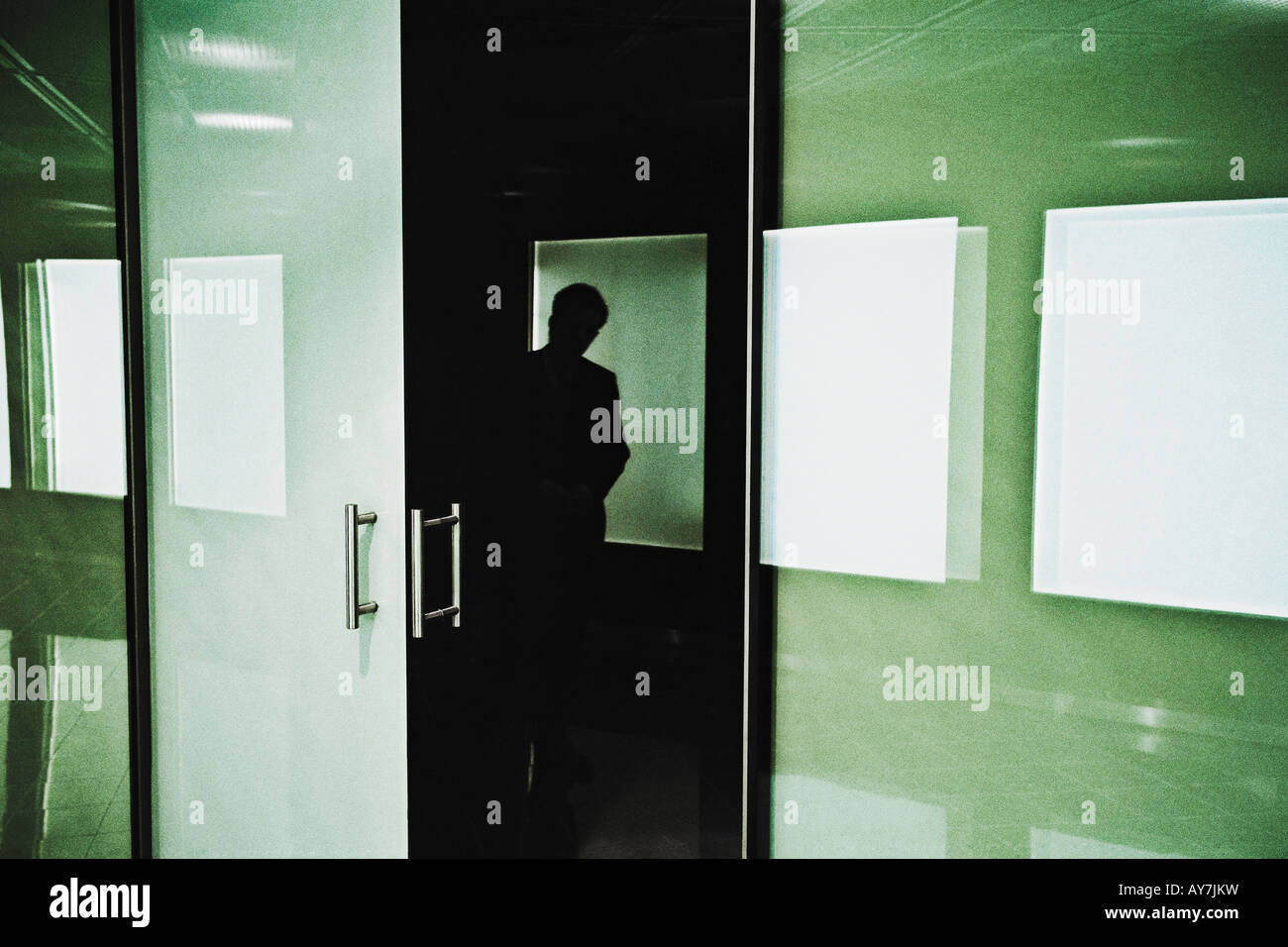 One Office Worker In Abandoned Office At Night Stock Photo - Alamy
