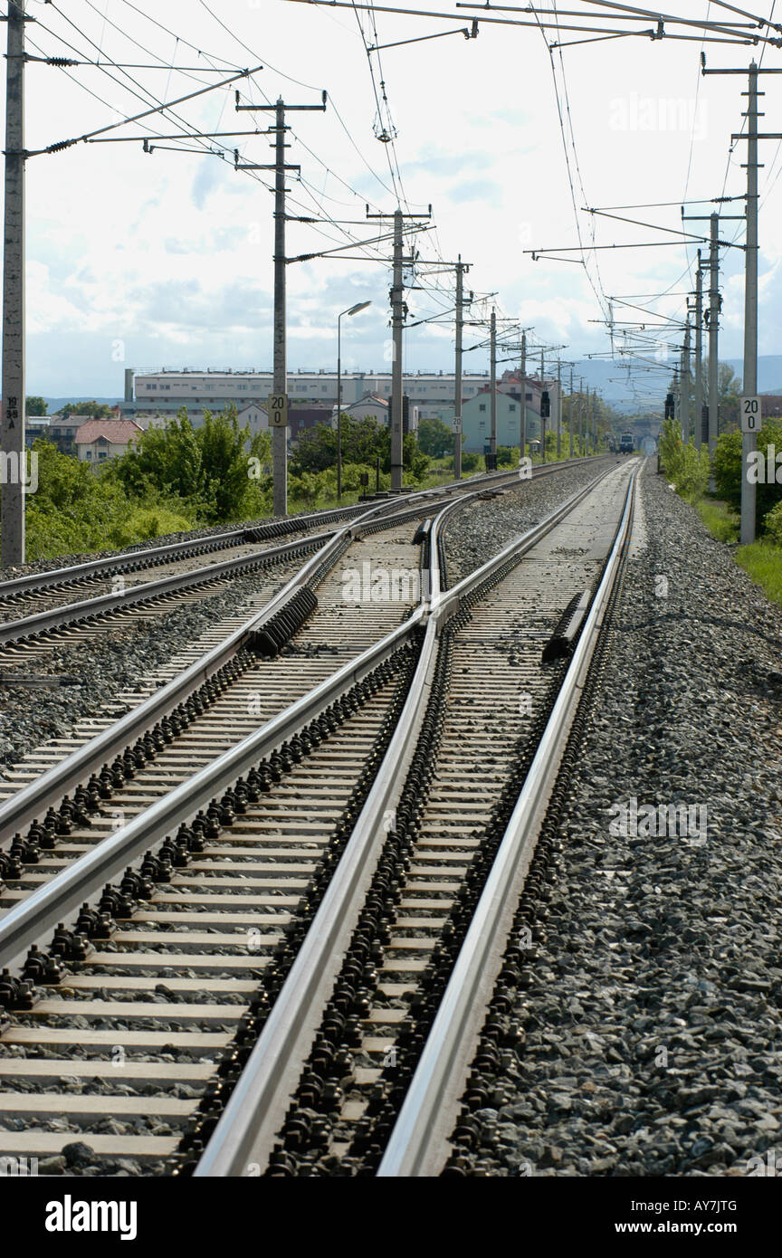 Rails on embankment with switch Stock Photo - Alamy