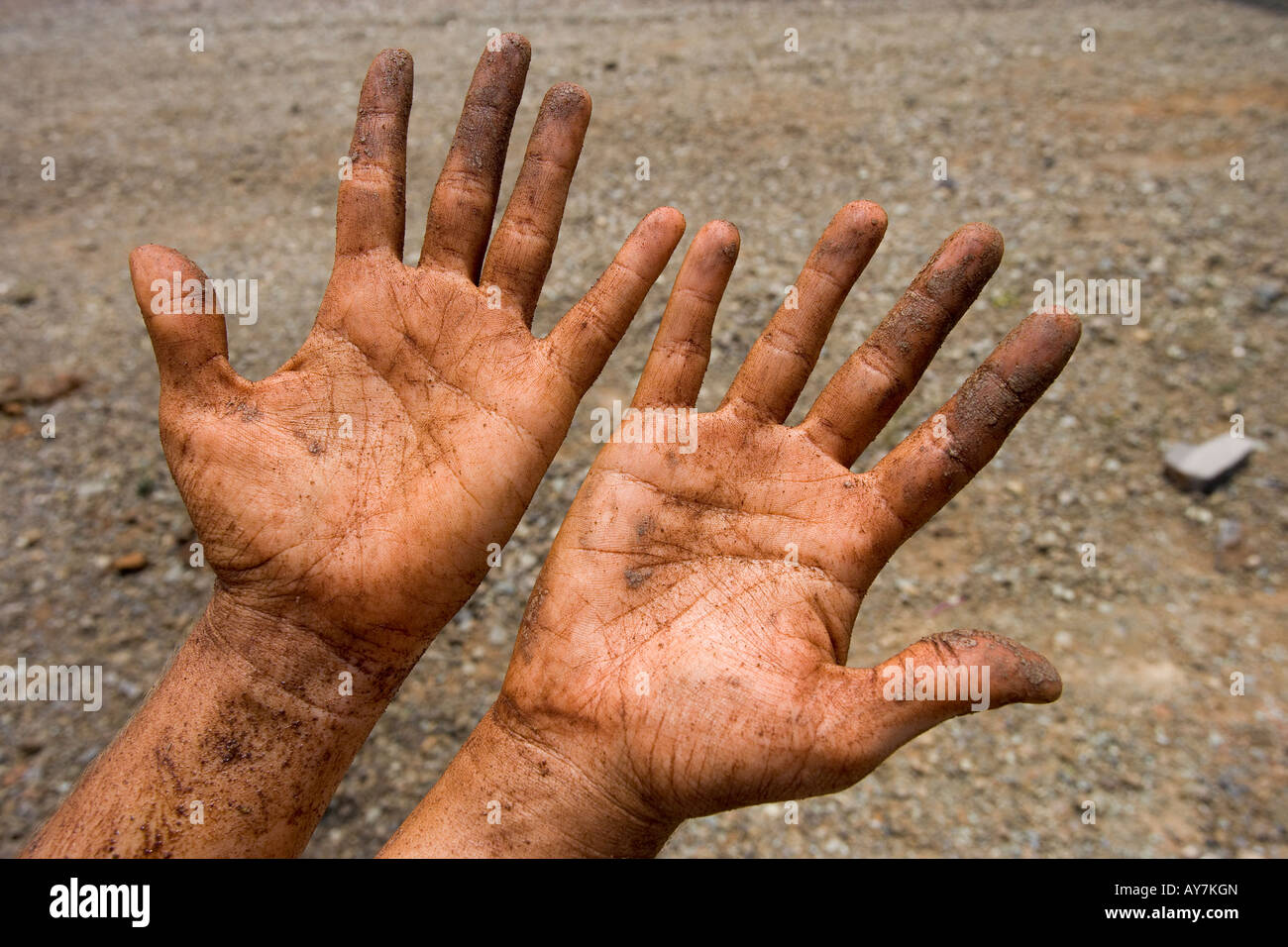 Pair Of Muddy Hands High Resolution Stock Photography and Images - Alamy
