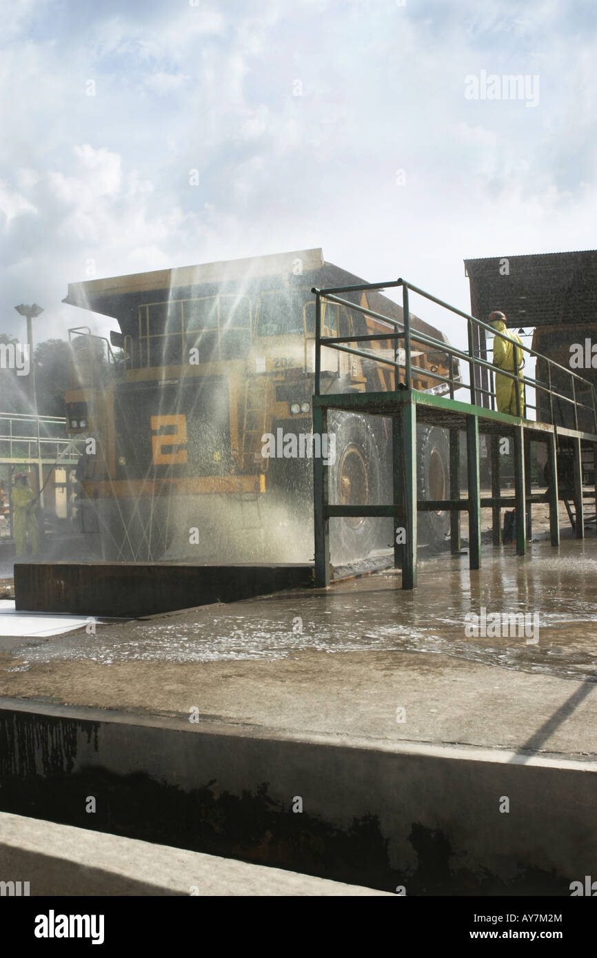 Mining vehicles maintenance workshop. Caterpillar 777 Haul truck being ...