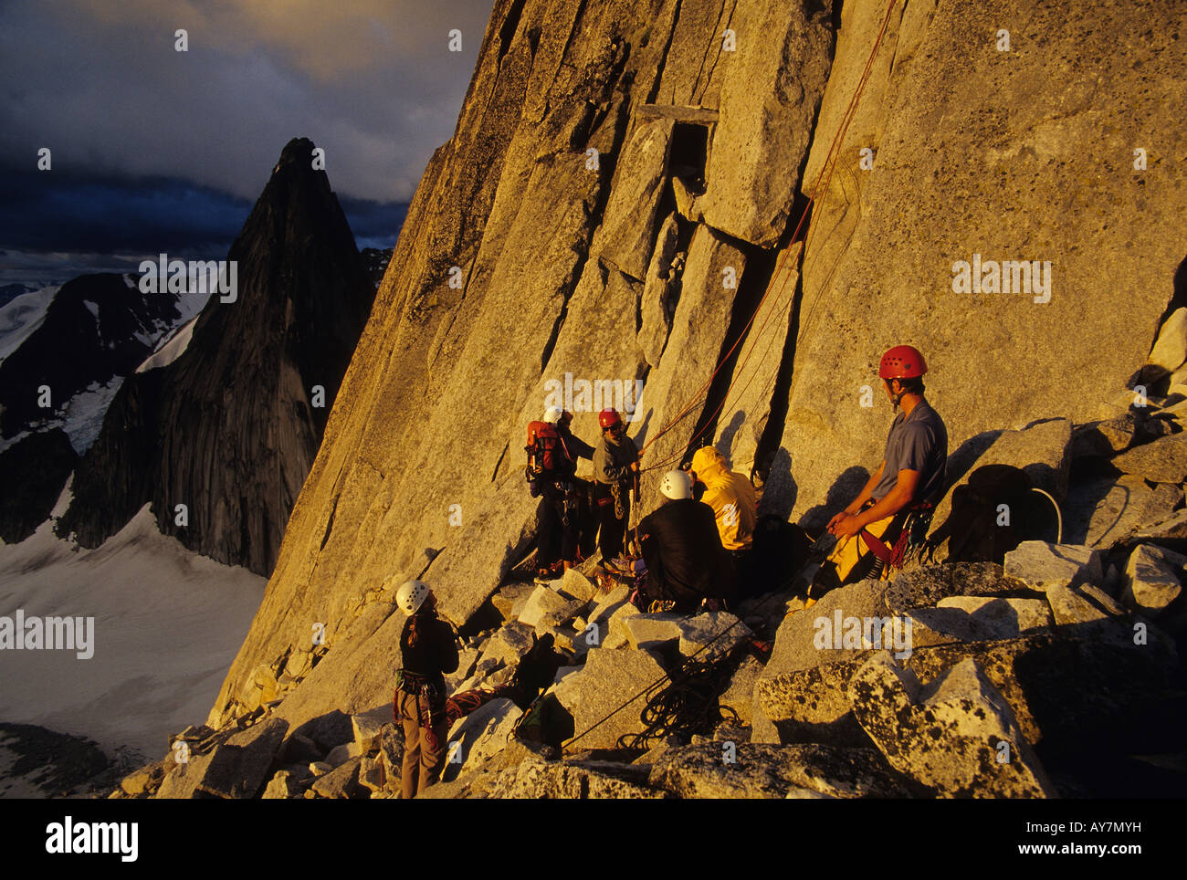 Climbers at the base of Bugaboo spire gearing up to climb the NE ridge ...