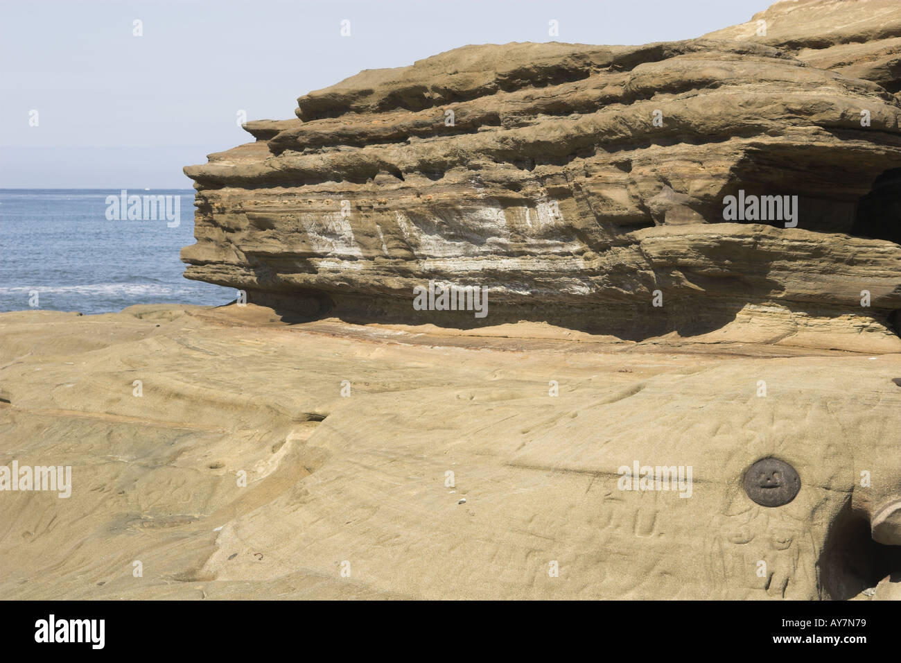 Horizontal image of rock formation and ocean Stock Photo - Alamy