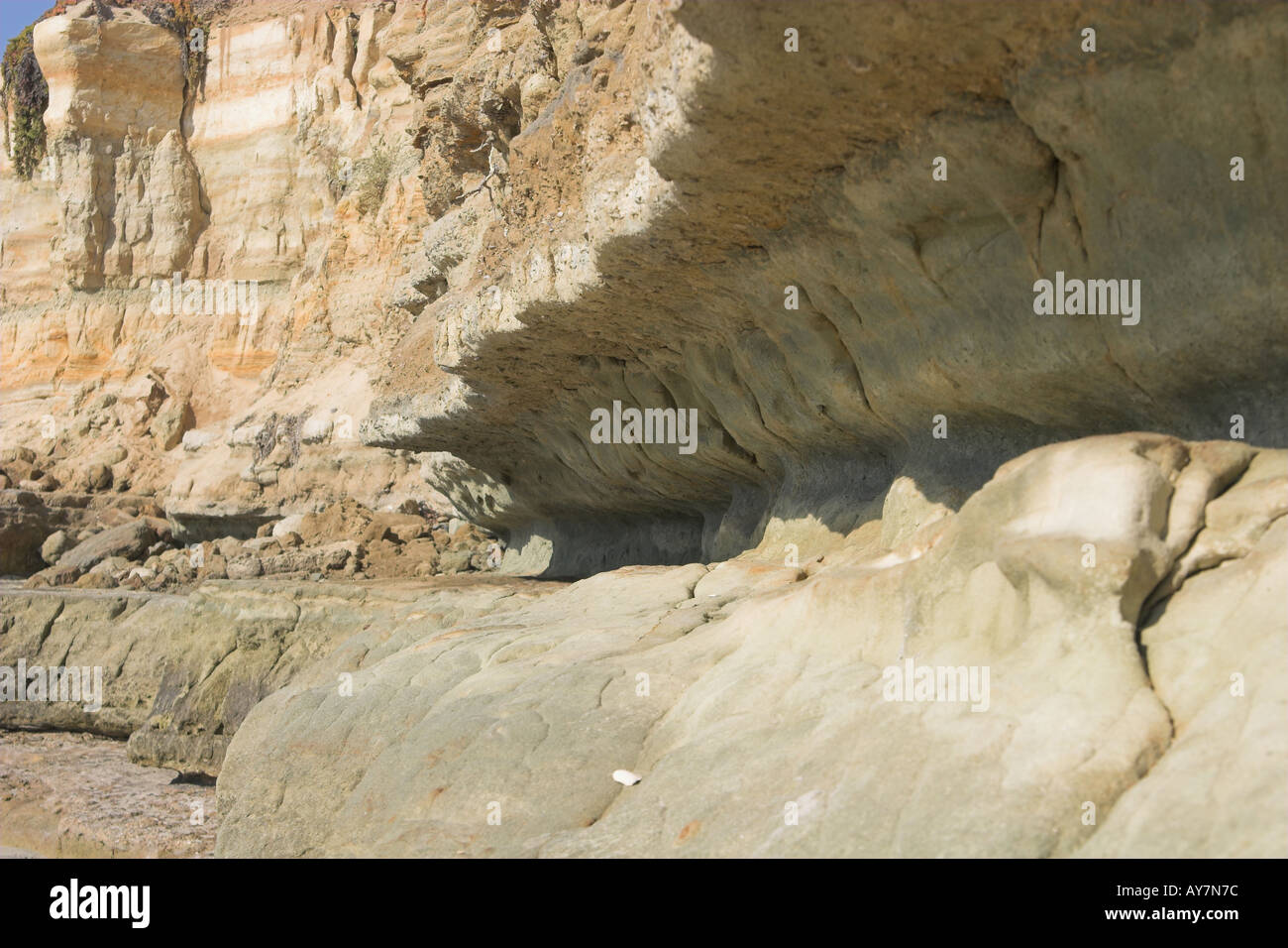 Horizontal image of rock formation at shoreline Stock Photo - Alamy